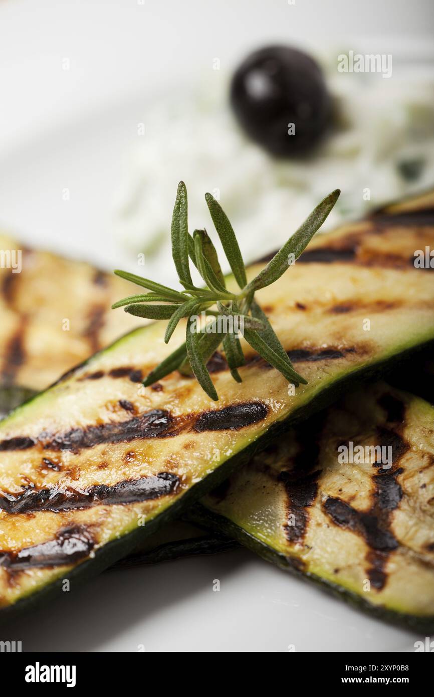 Grilled courgettes with rosemary Stock Photo - Alamy