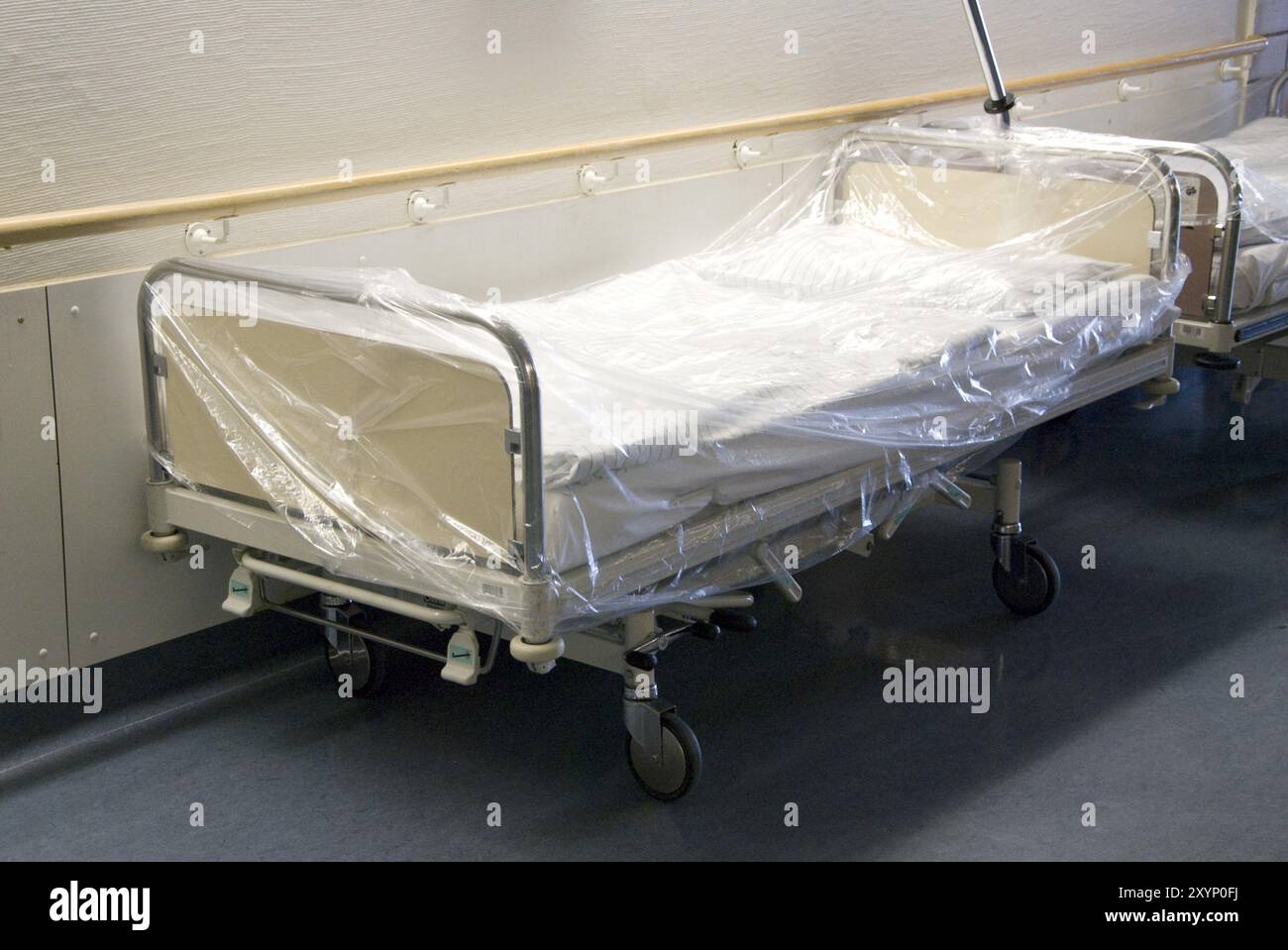 Hospital bed with neon light Stock Photo - Alamy