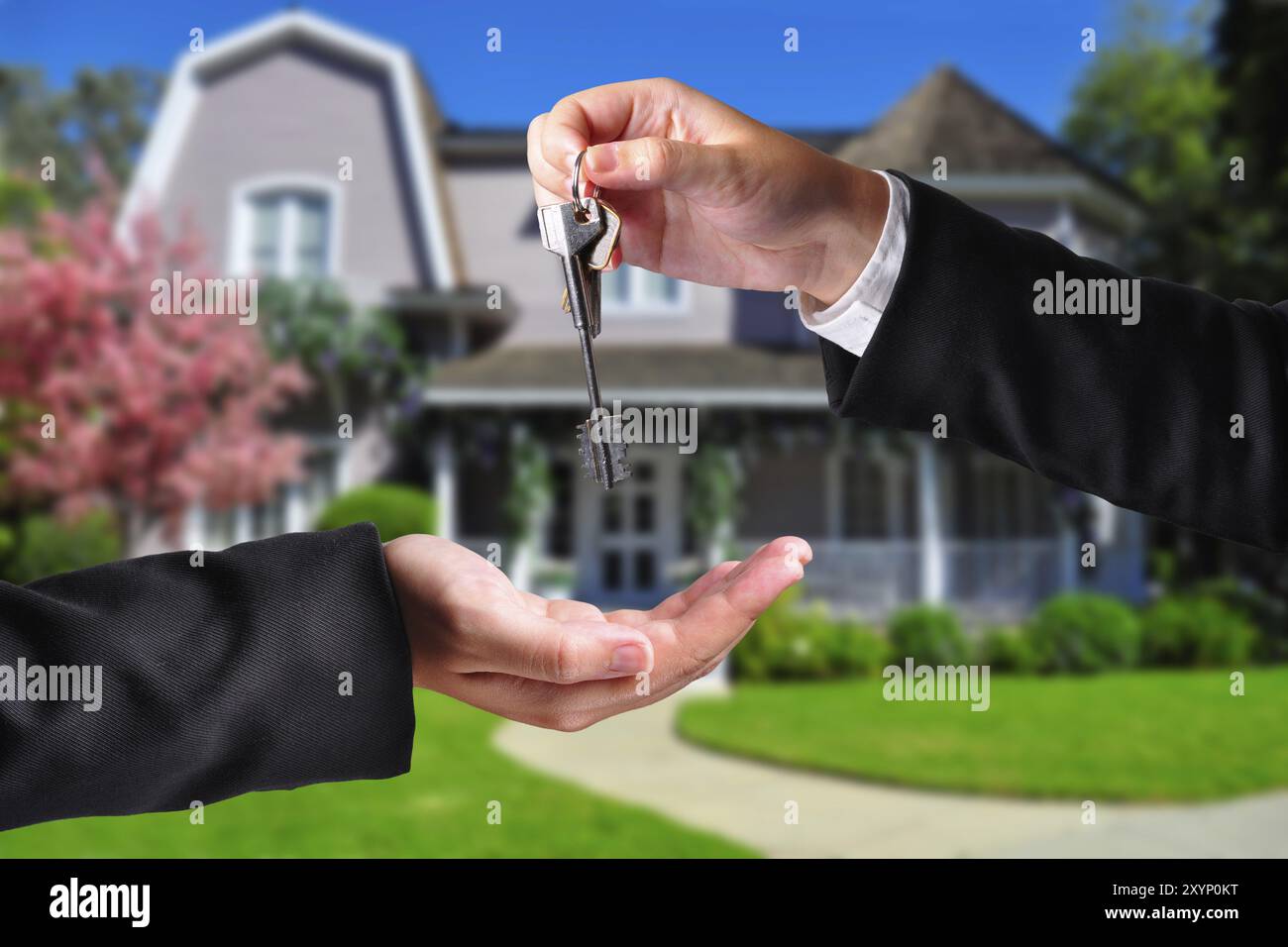 Hand giving key another hand hi-res stock photography and images - Alamy