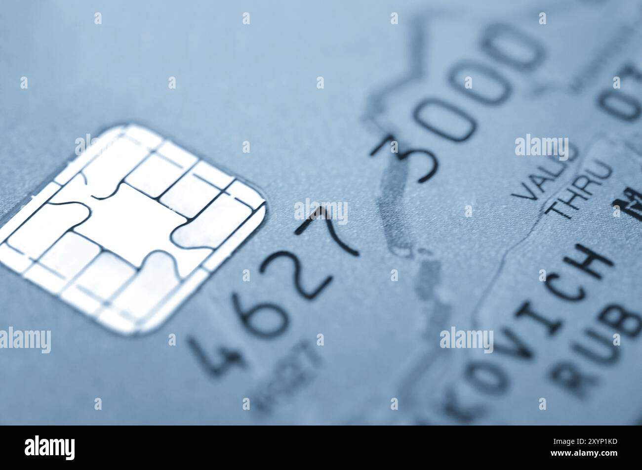 Details of a credit card with chip and numbers. Macro Stock Photo - Alamy