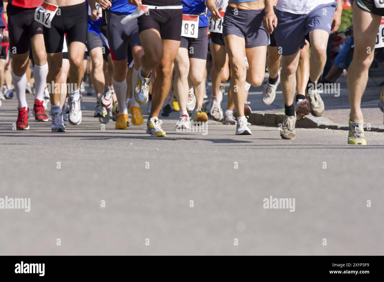 Runners feet on asphalt Stock Photo - Alamy