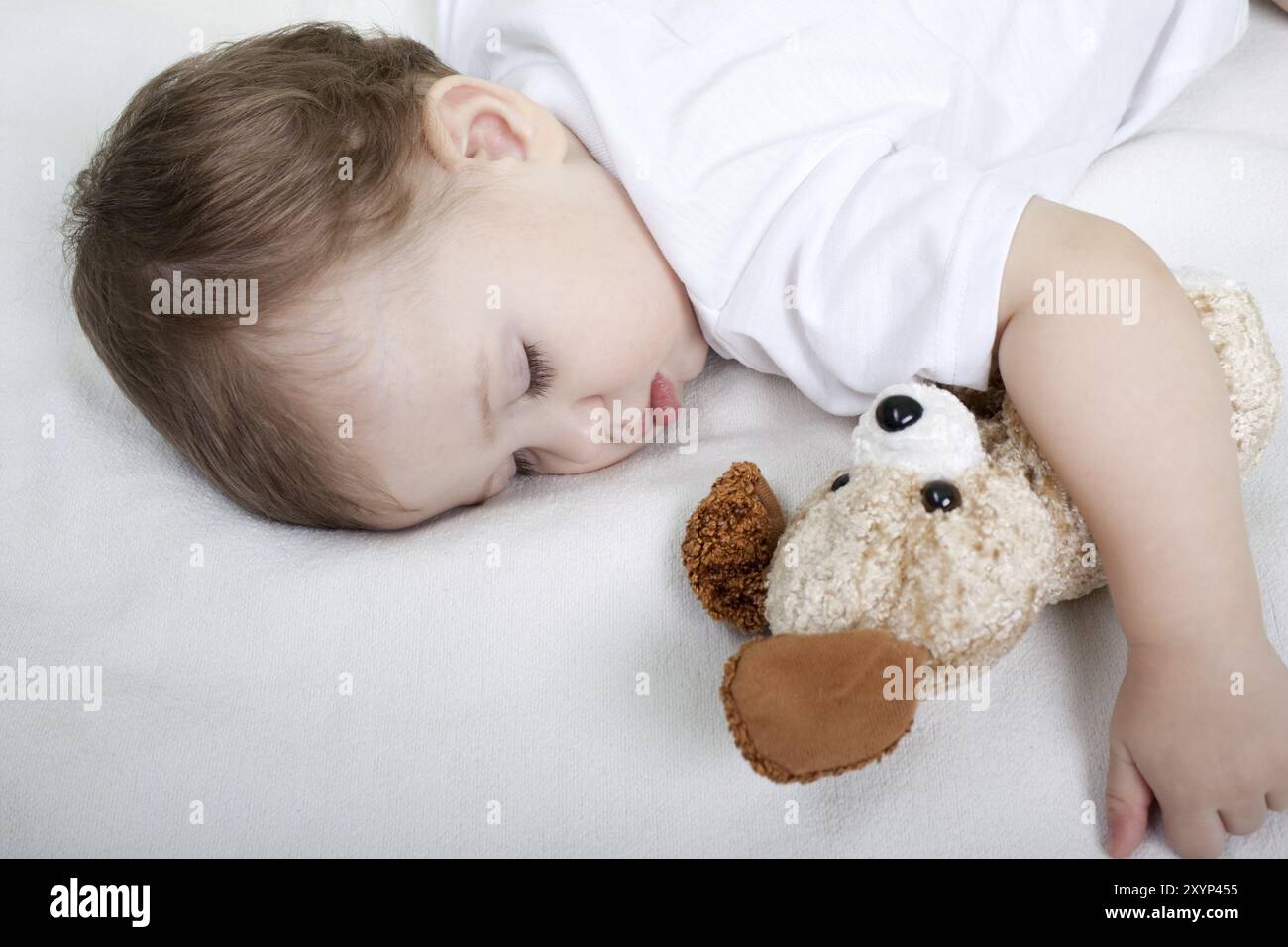 Little child sleeping in happiness and family love Stock Photo - Alamy