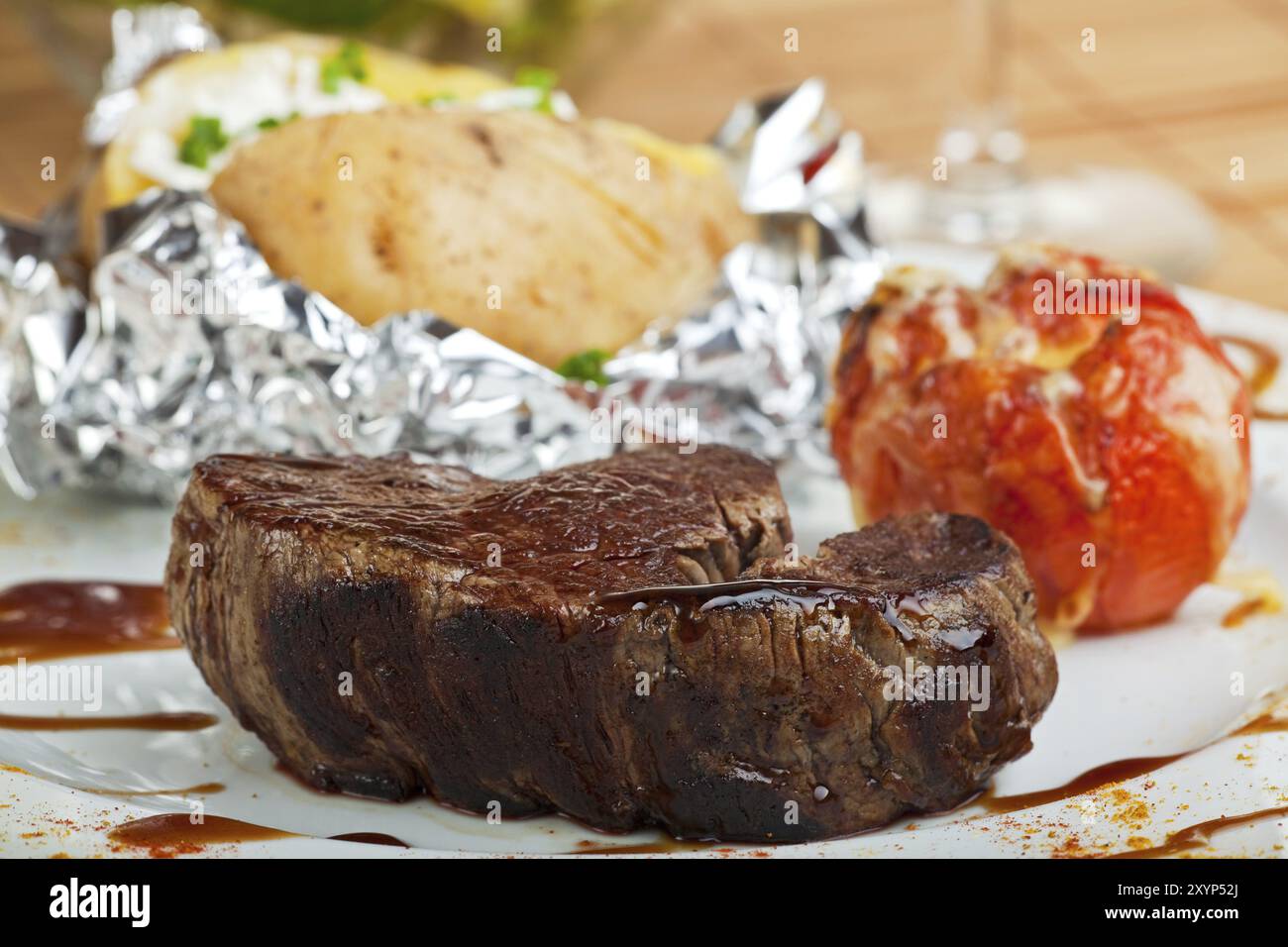 Grilled steak with jacket potato Stock Photo - Alamy