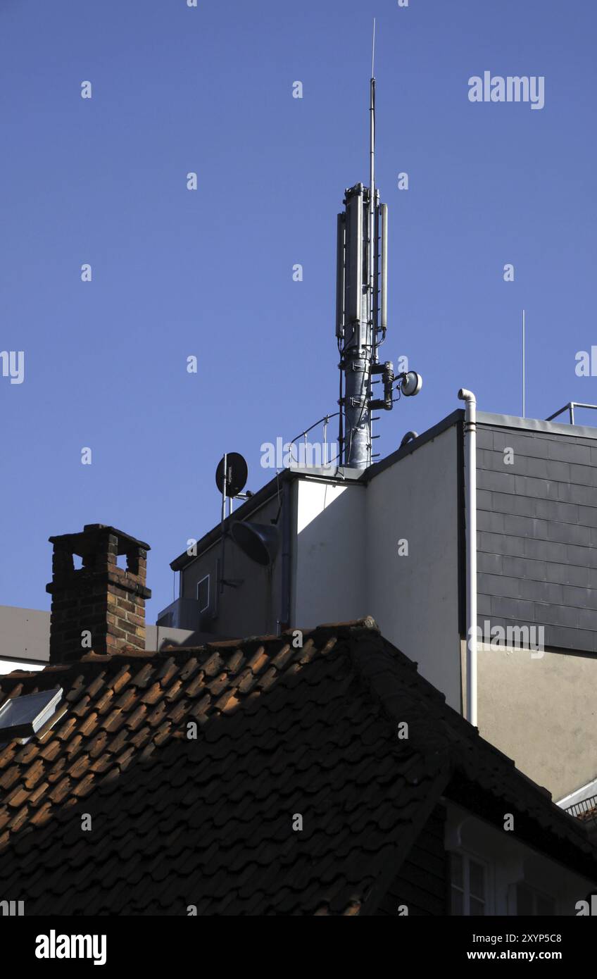 Mobile phone antenna on a roof Stock Photo - Alamy