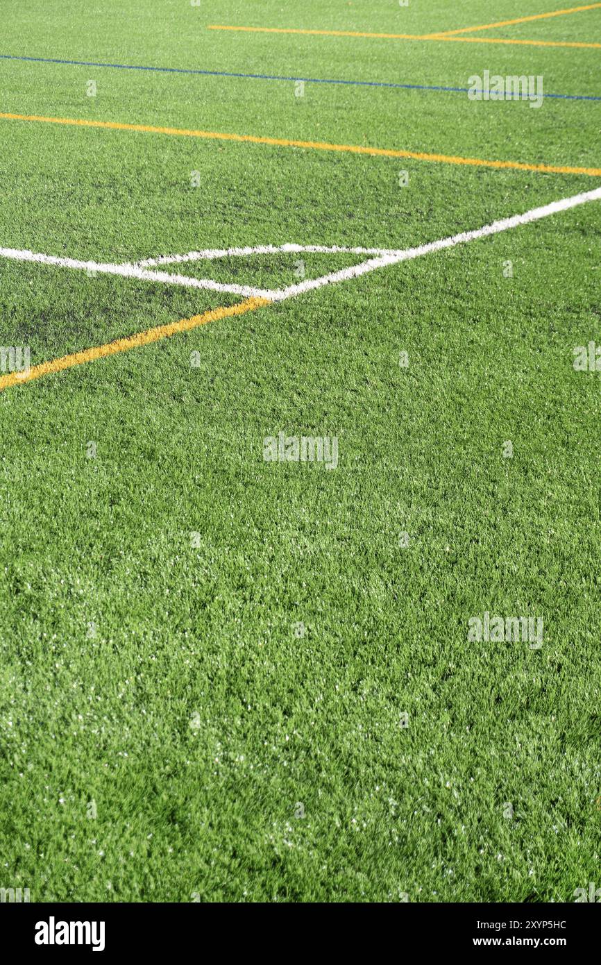 Soccer field with a new artificial turf field, white corner marking ...