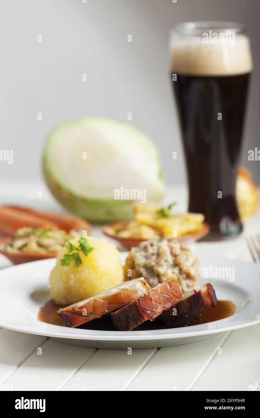 Bavarian roast pork and beer Stock Photo - Alamy