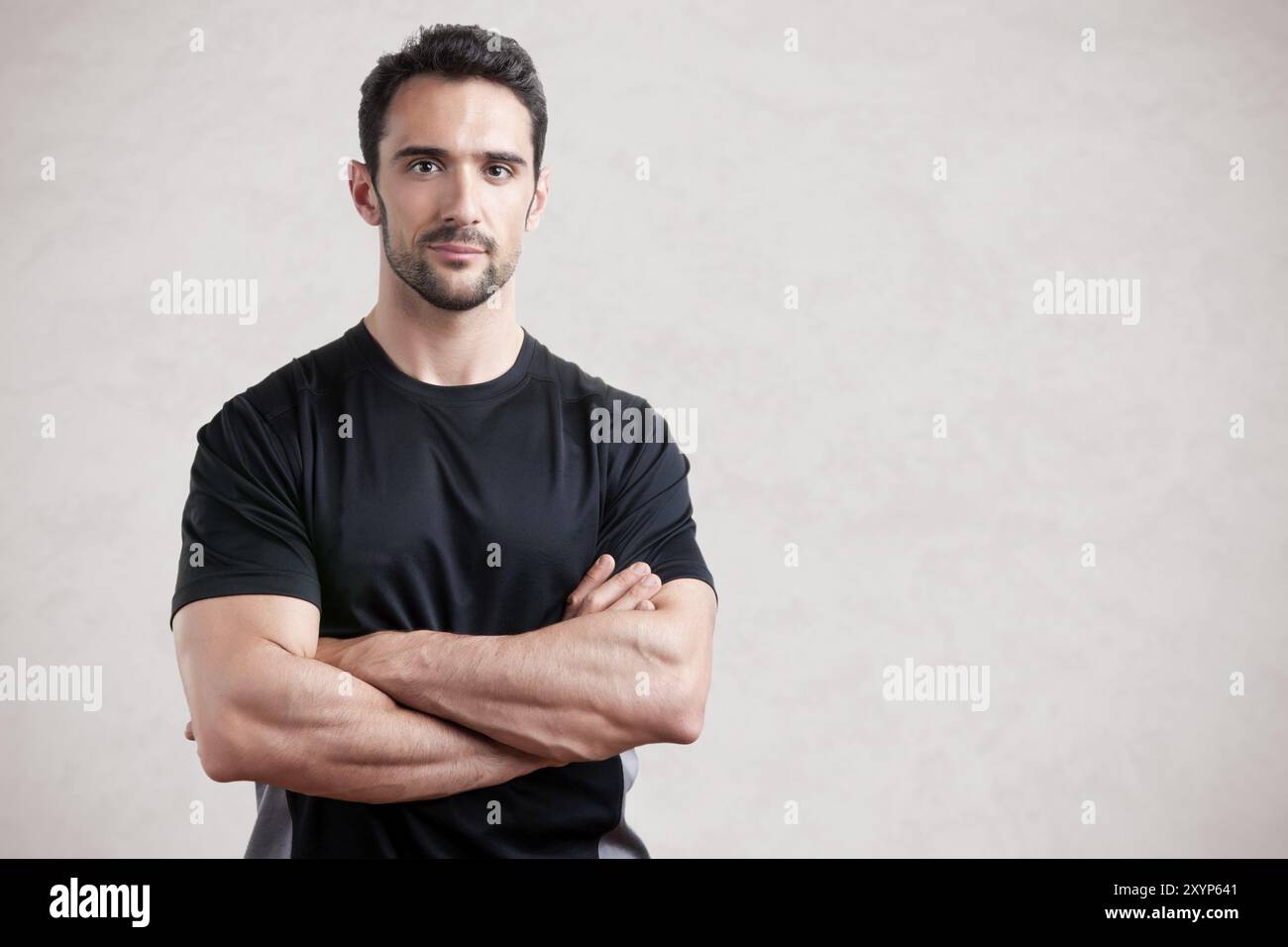 Personal trainer arms crossed in hi-res stock photography and images ...