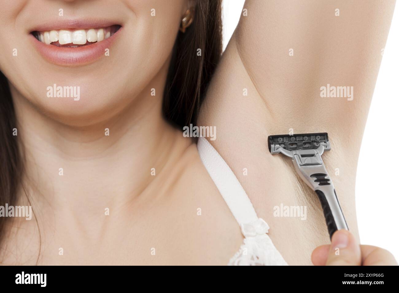 Beauty toothy smiling young woman hand holding razor sharp blade ...