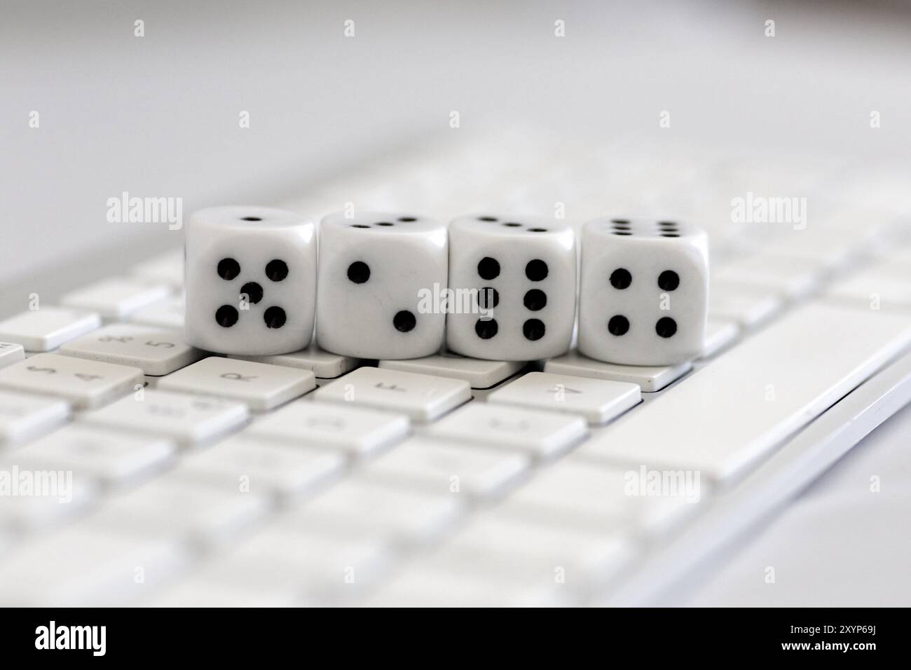 Cube on a keyboard Stock Photo - Alamy