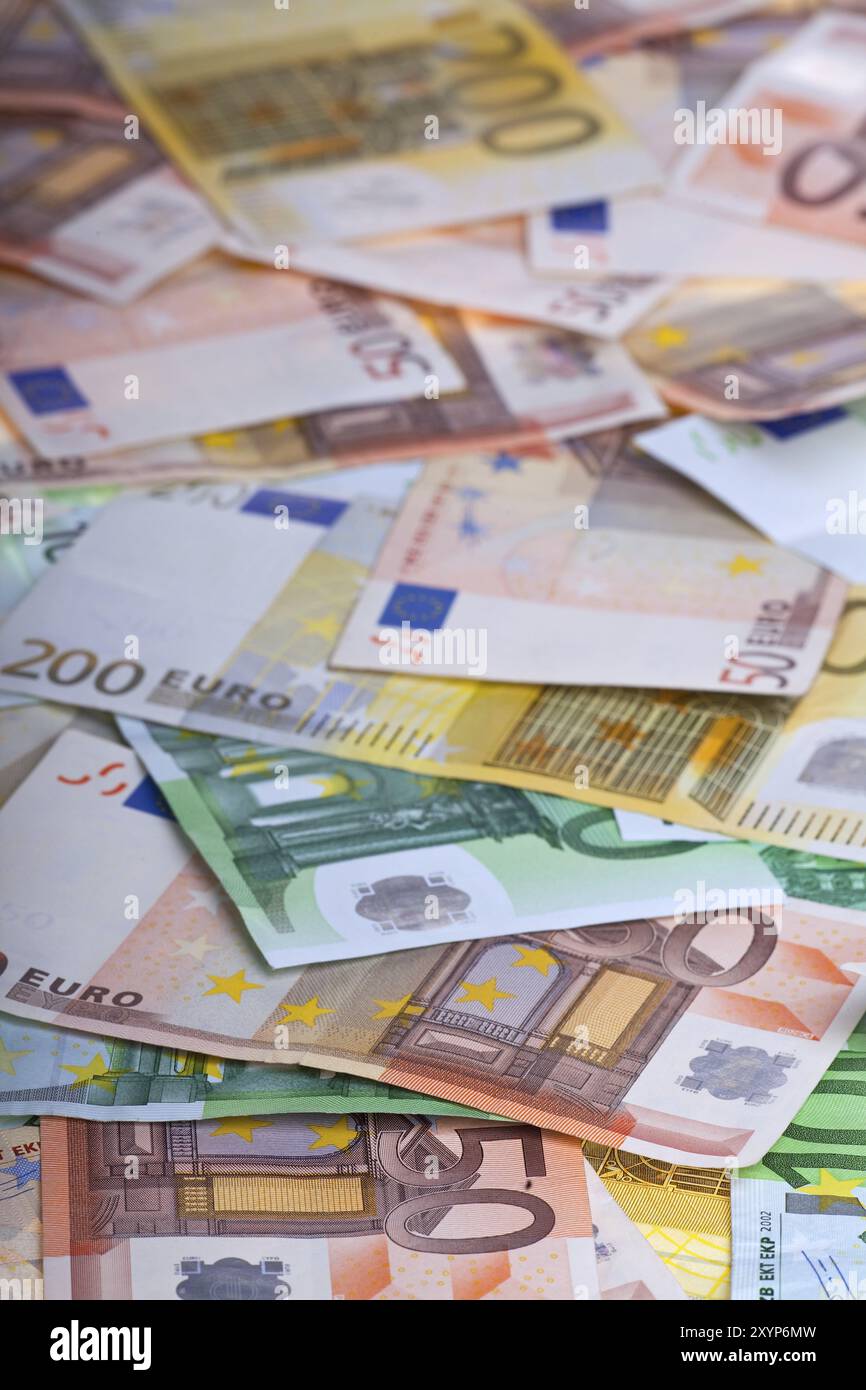 Many euros on white Stock Photo - Alamy