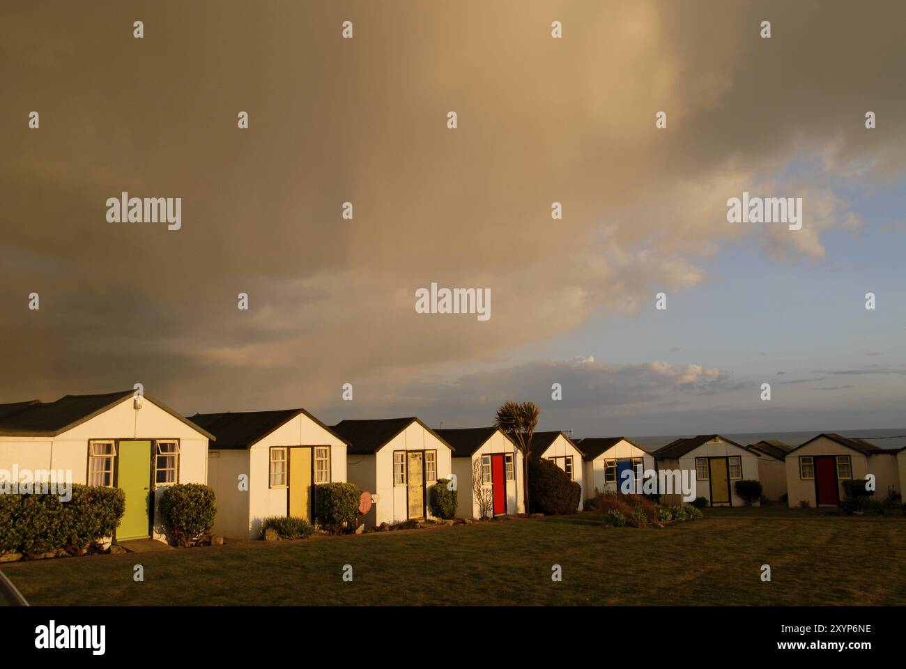 Chalets at Brighstone Holiday Centre, Isle Of Wight, in sunset light ...
