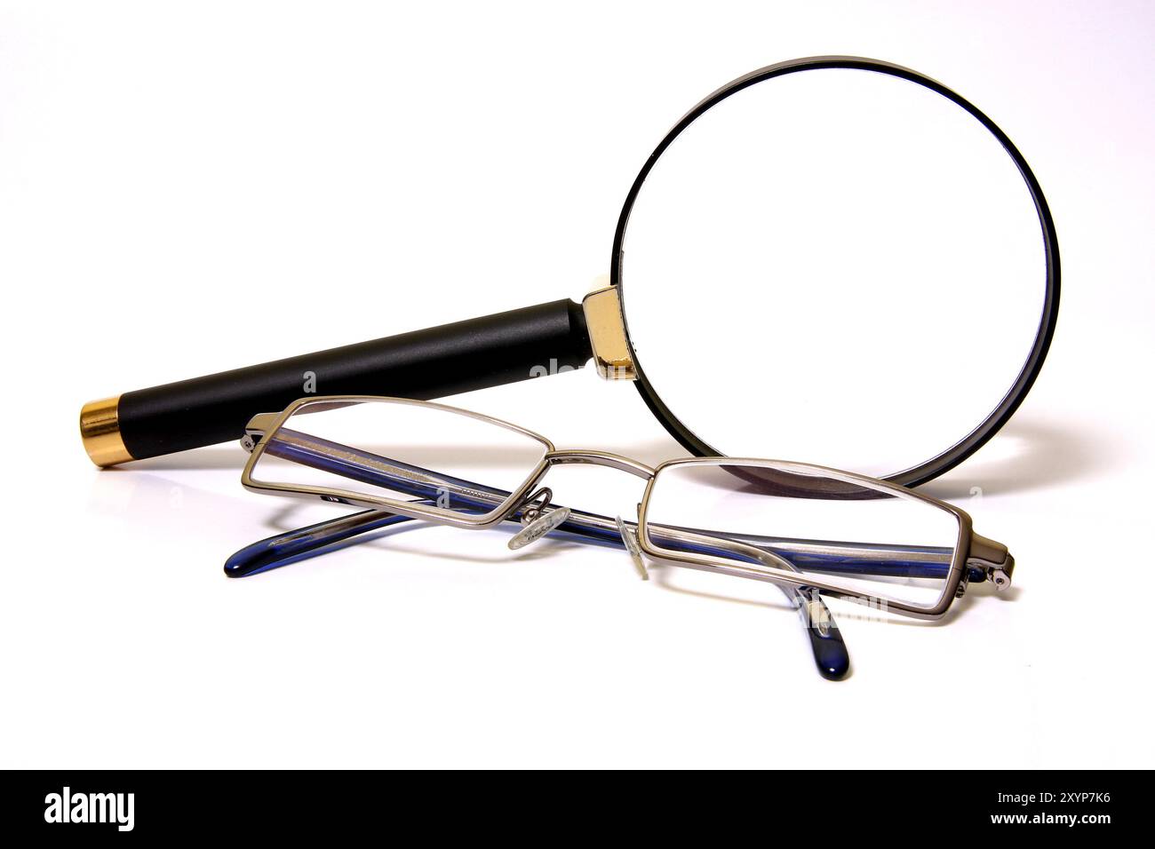 Magnifying glass and glasses Stock Photo - Alamy
