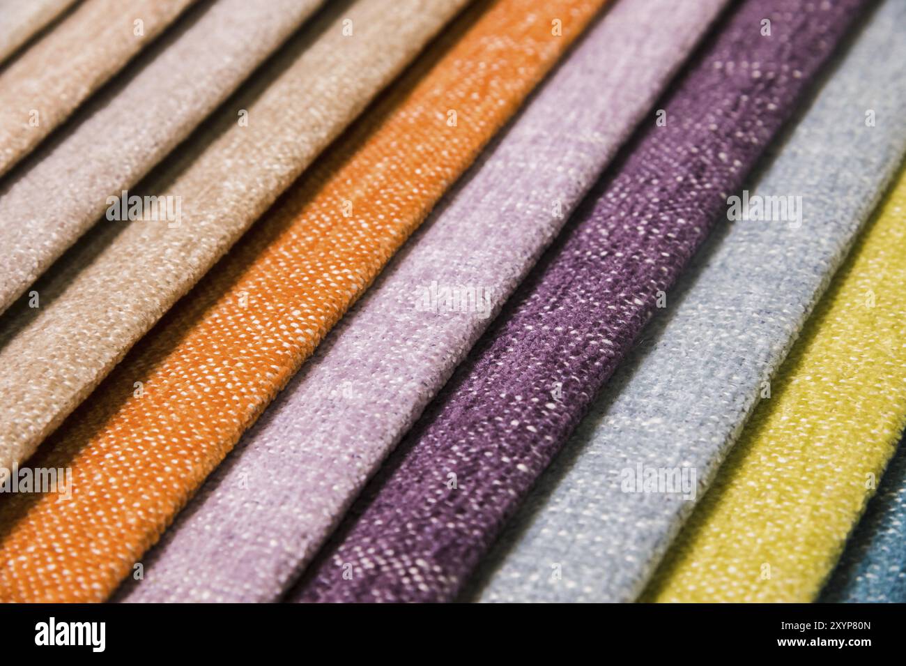 Colorful and bright fabric samples of furniture and clothing upholstery ...