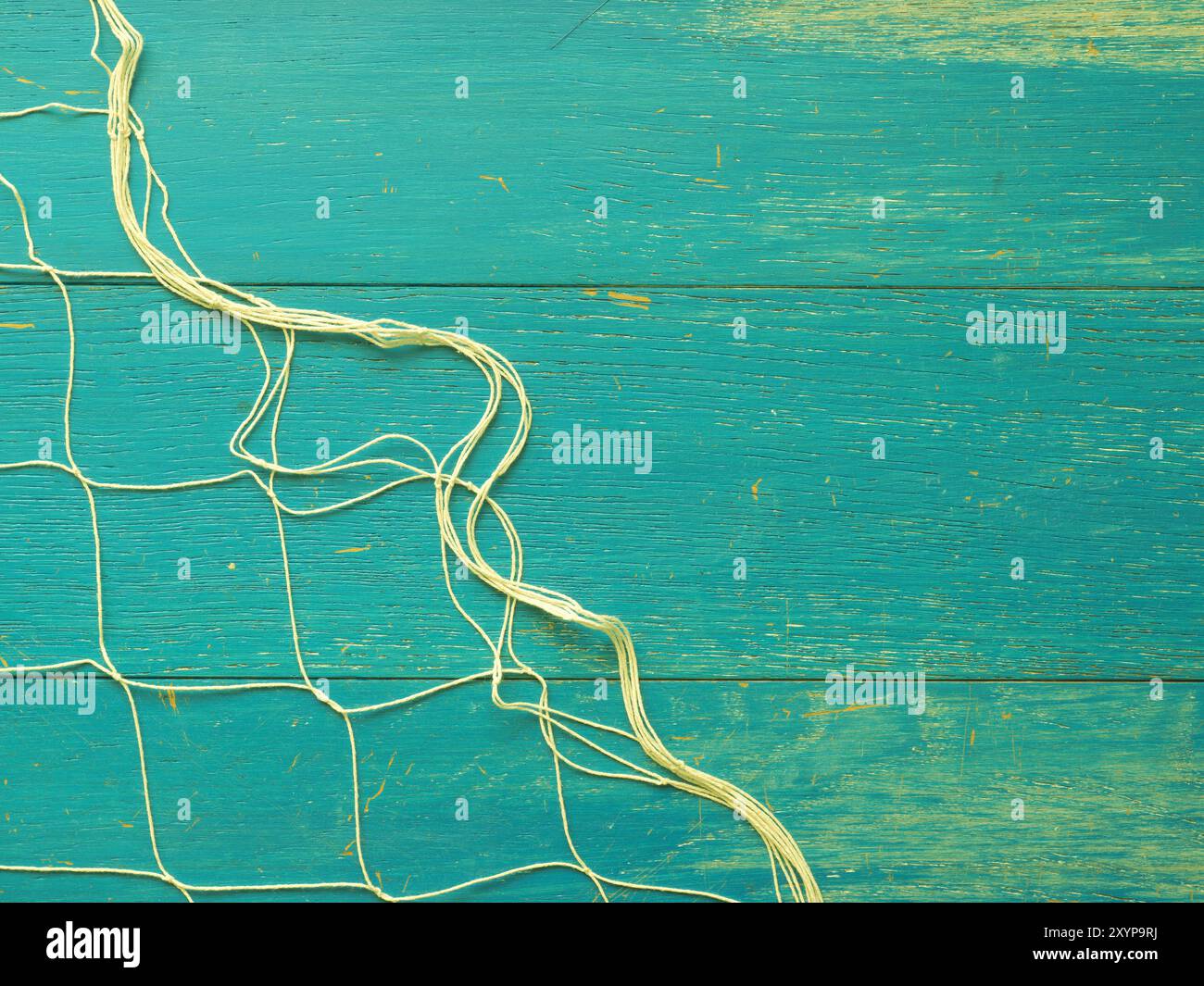 Old weathered wood texture with a fishing net, seafood restaurant or ...