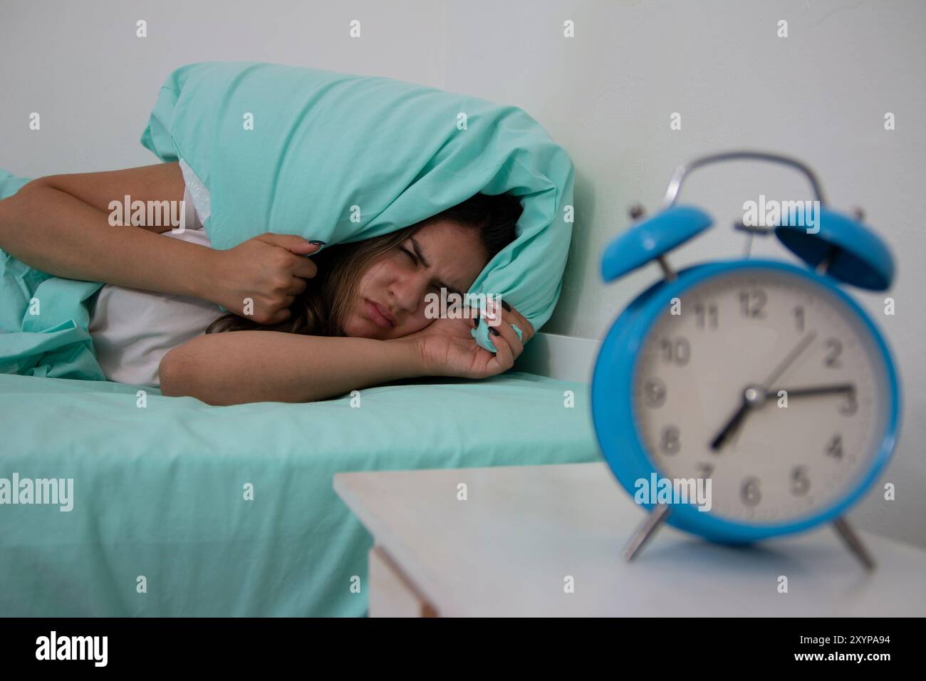 Teen girl hates waking up early in the morning.Beautiful girl feeling ...