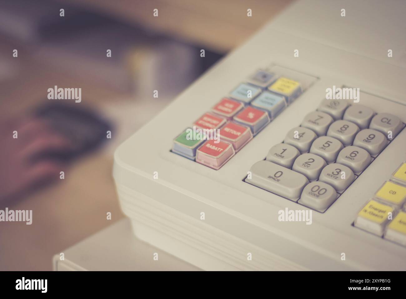 Cash register in a shop: Customer is paying purchase Stock Photo - Alamy