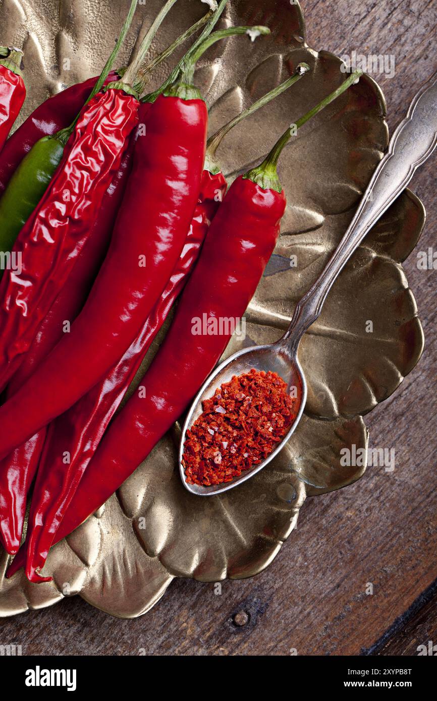 Fresh, dried and ground chilli peppers Stock Photo - Alamy