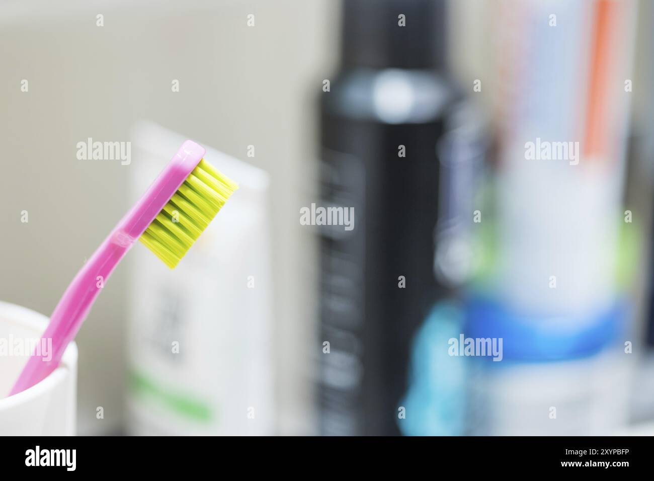 Colorful toothbrush in the bathroom, morning routine Stock Photo - Alamy