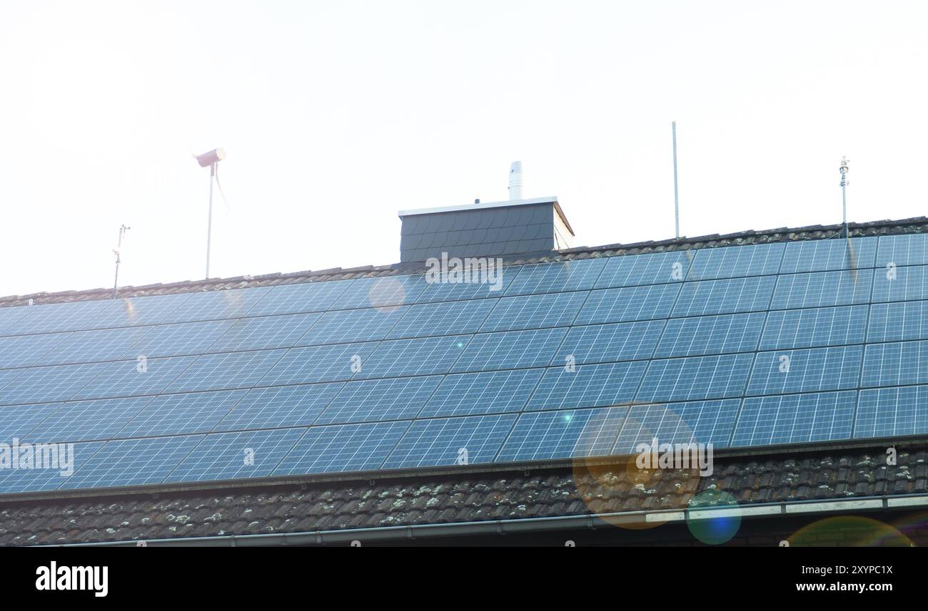 Solar panels on a roof, alternative energy concept Stock Photo - Alamy