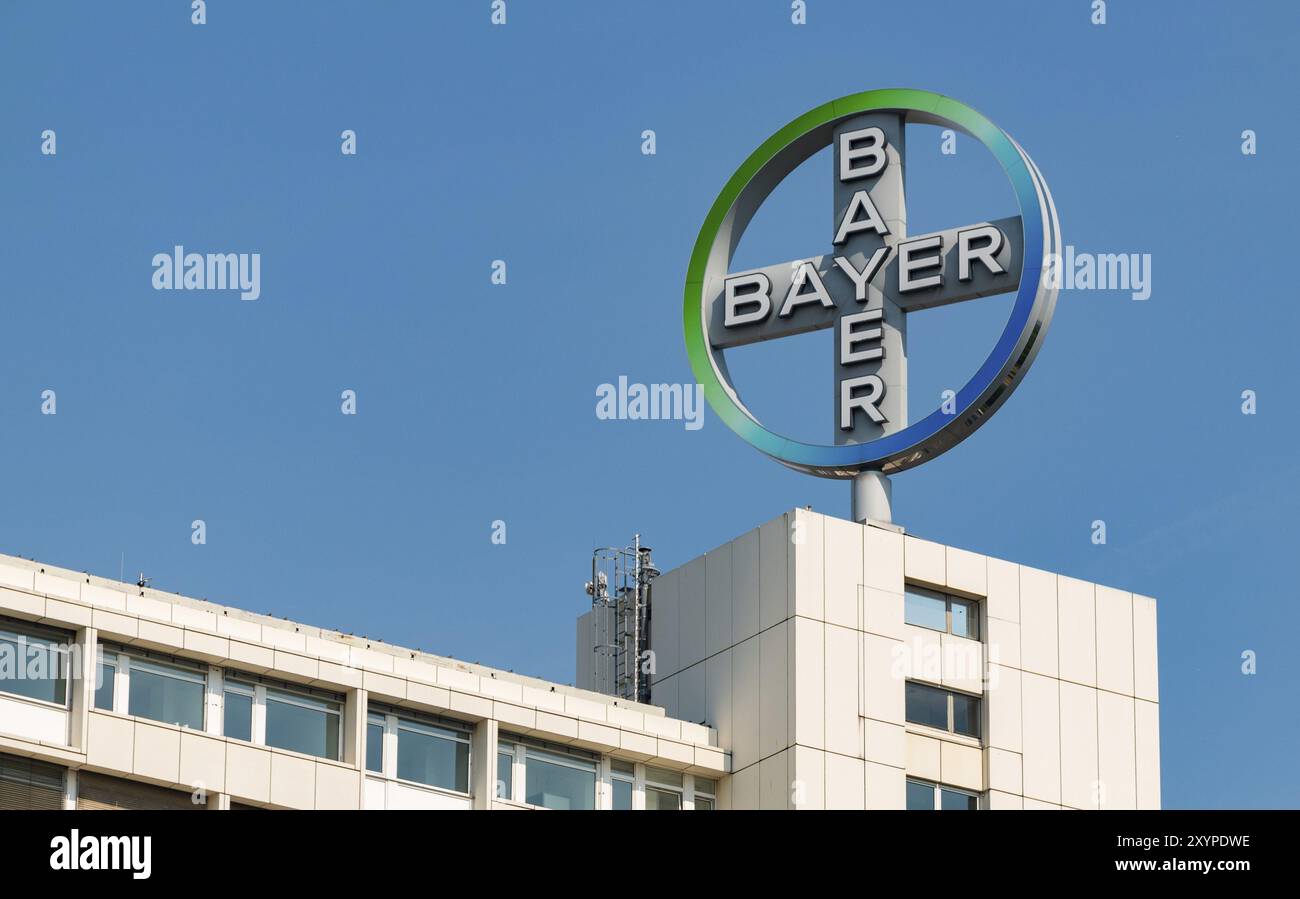 A picture of Bayer's logo on top of their Berlin's headquarters Stock ...