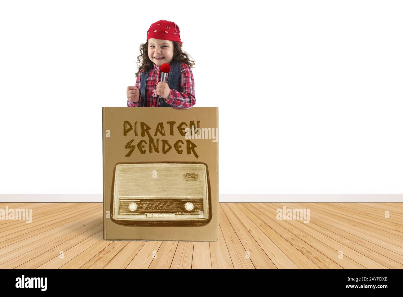 Child in a box with a microphone in his hand, photomontage Stock Photo ...