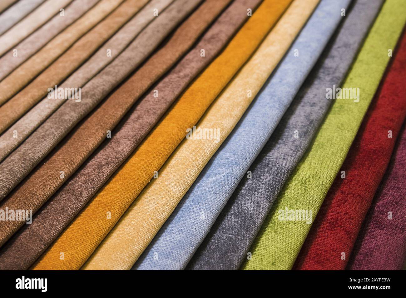 Colorful and bright fabric samples of furniture and clothing upholstery ...