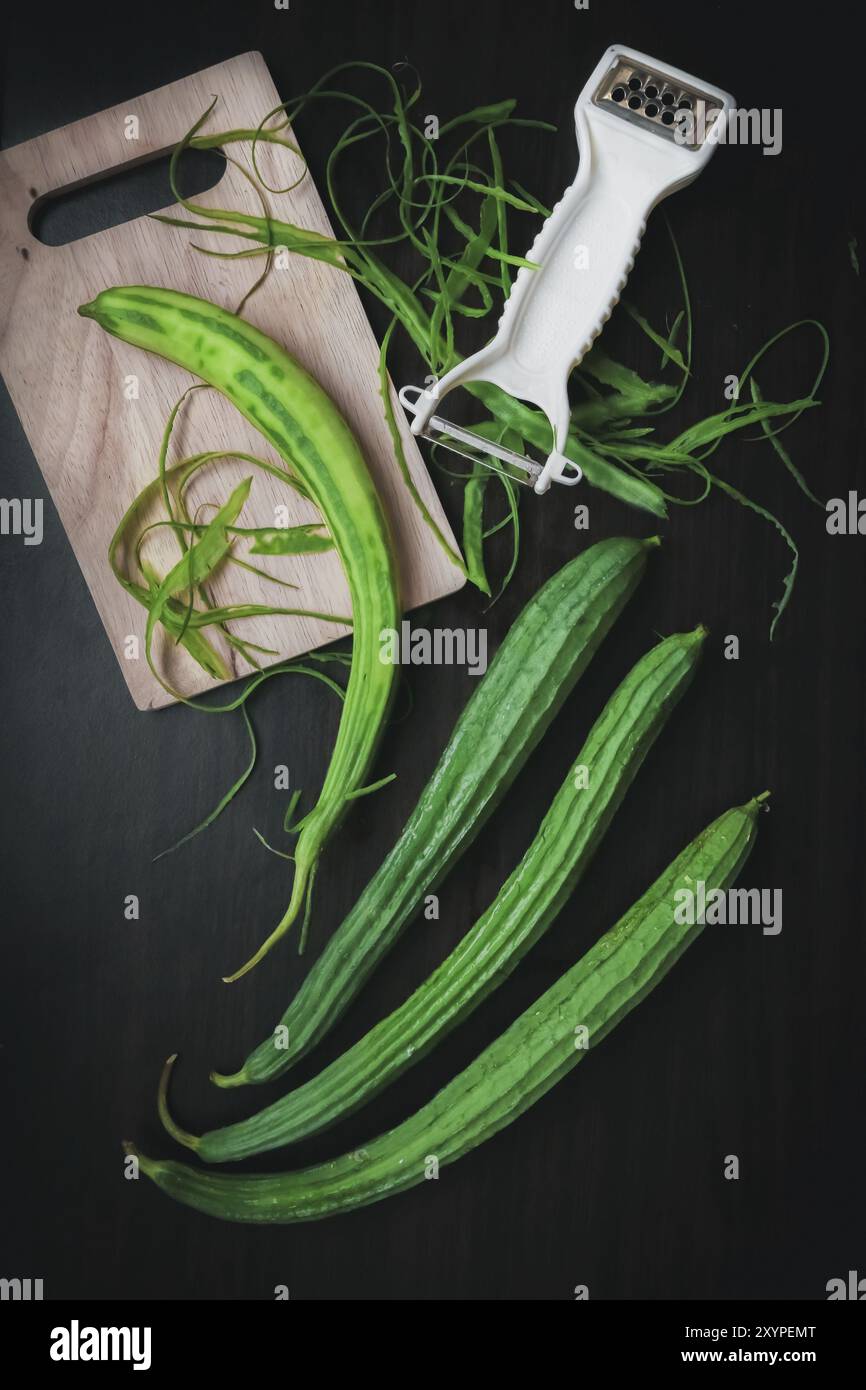 Angled Gourd or Angled Loofah Sponge gourd with Mystic Light on black ...