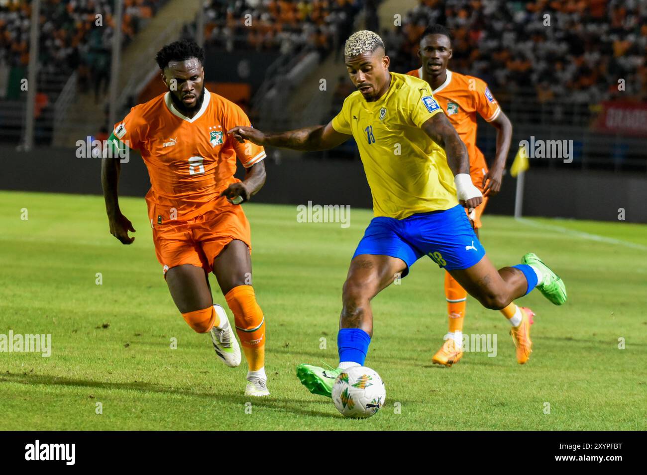 ABIDJAN, COTE D'IVOIRE - JUNE 7: Lemina Mario of Gabon and Kessie ...