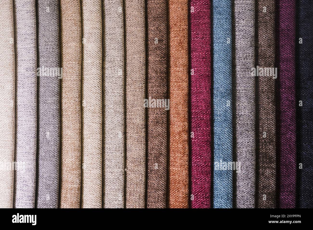 Colorful and bright fabric samples of furniture and clothing upholstery ...