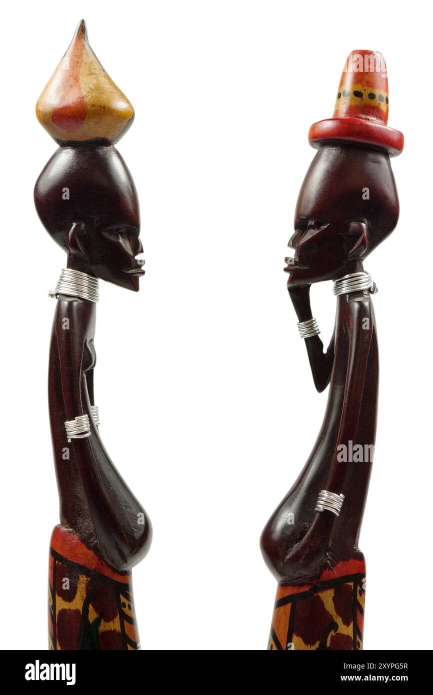 Wooden figures from Namibia, Africa, against a white background Stock ...