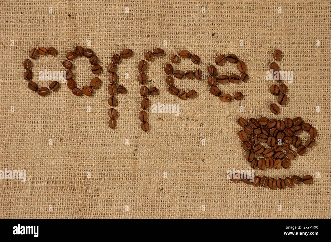 Conceptual artistic pattern of a cup of coffee made from coffee beans ...