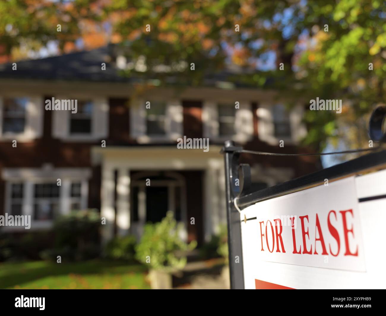 For lease sign in front of a large house in fall. Toronto, Ontario ...