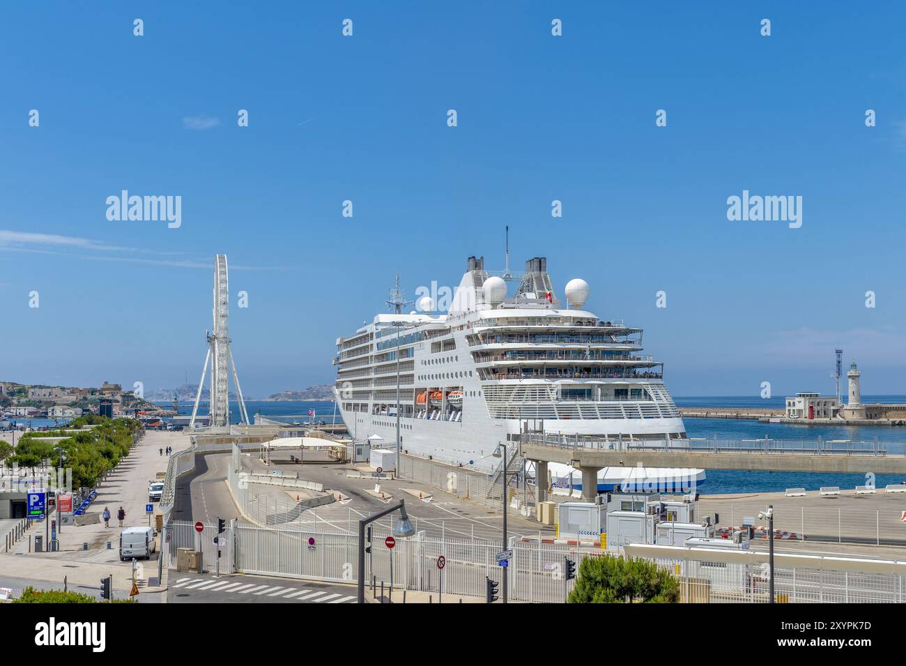 Cruise ship and Ferris wheel in the harbour Stock Photo - Alamy