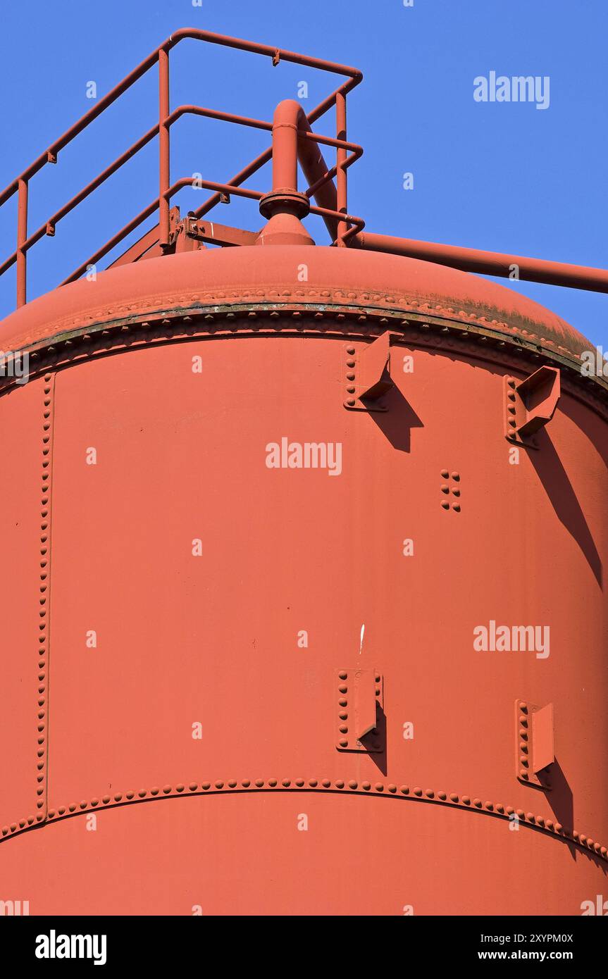 Large industrial tank with rows of rivets and red-brown colour Stock ...