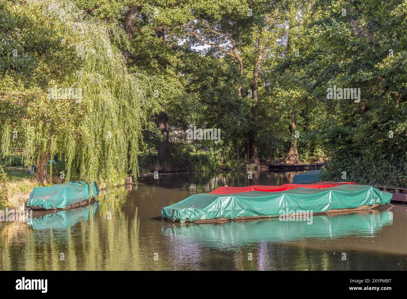2 Spreewald barges, covered and tied down Stock Photo - Alamy