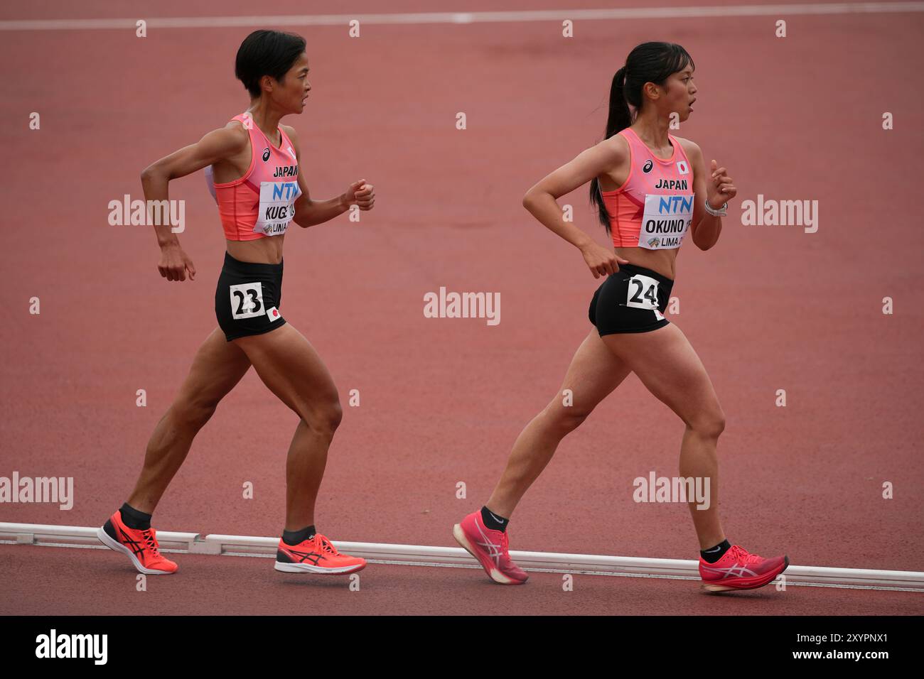 Japan's Suzuka Kuge, left, and Suzu Okuno compete in the women's 10,000-meter race walk final at ...