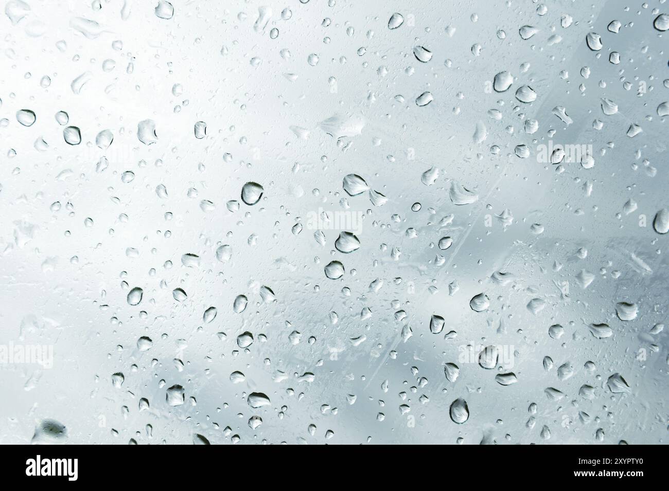 Textured background of window panes with a cloudy background. Natural ...