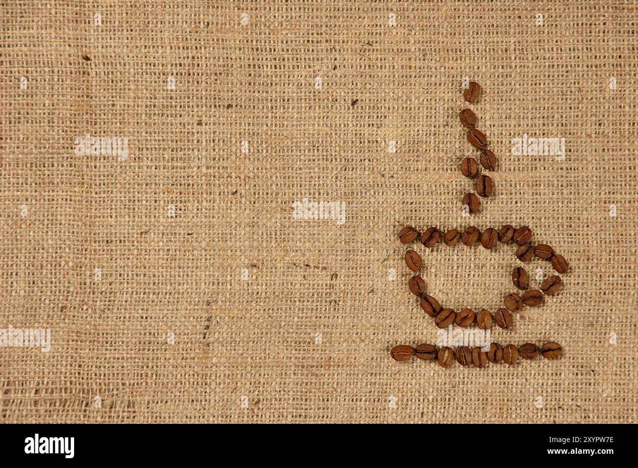 Conceptual artistic pattern of a cup of coffee made from coffee beans ...