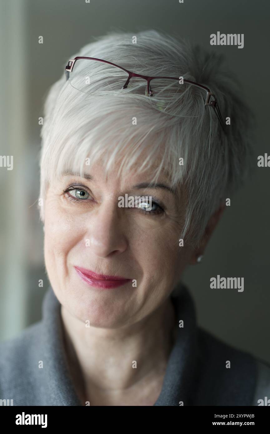 Elderly woman smiles camera in hi-res stock photography and images - Alamy