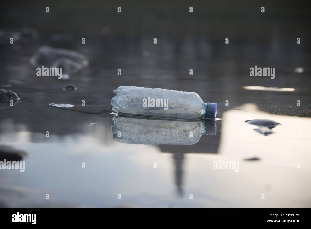 Plastic bottles polluting shoreline hi-res stock photography and images ...