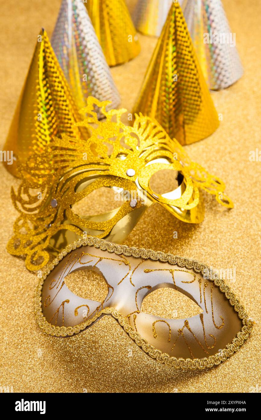Party and carnival still life in golden tone Stock Photo - Alamy