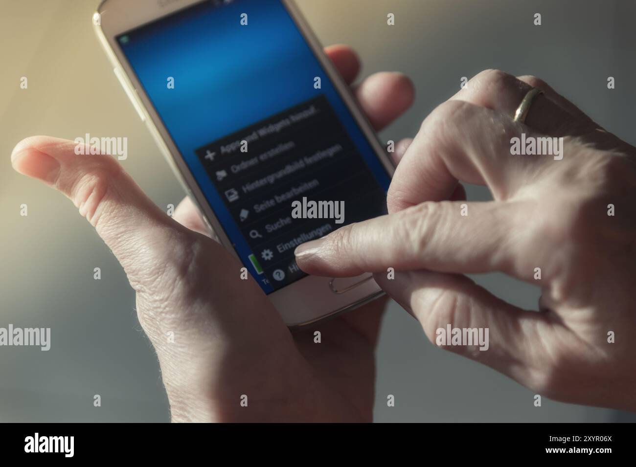 Hand holds smartphone personal hi-res stock photography and images - Alamy