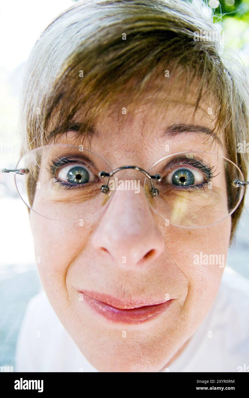 Woman with distorted face Stock Photo - Alamy
