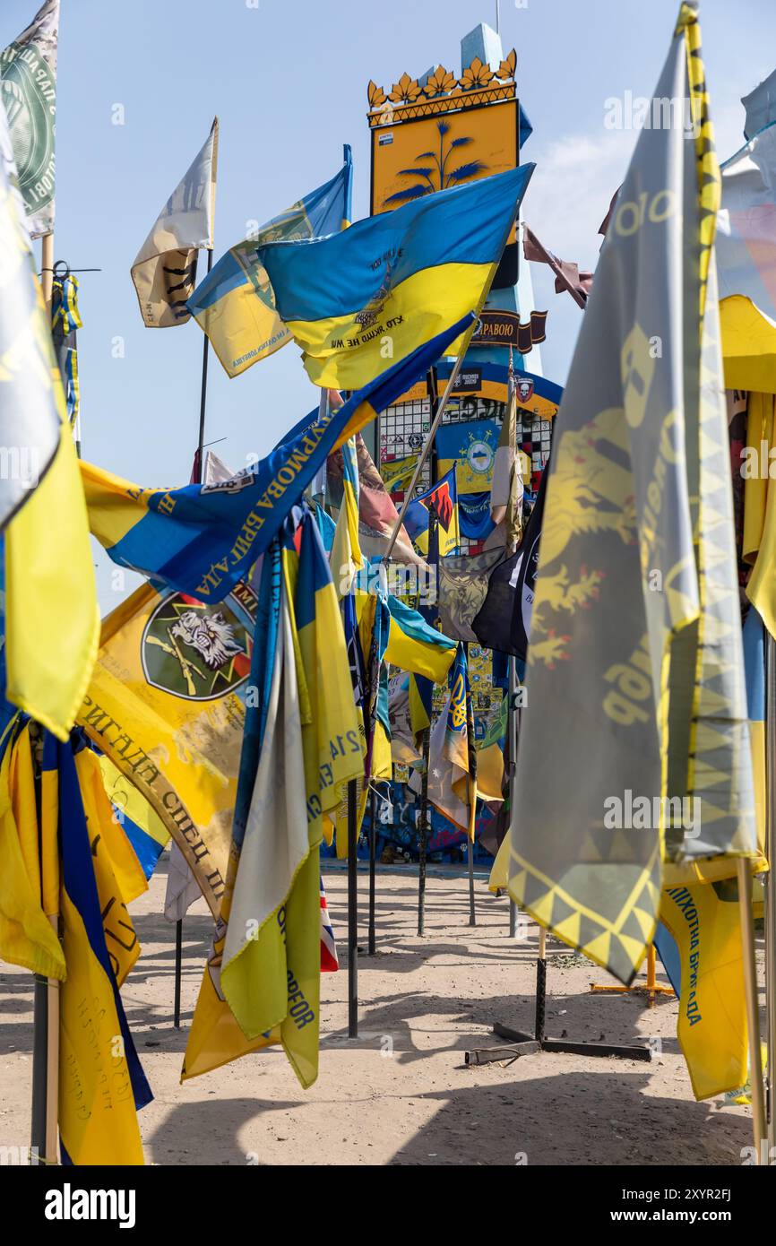 Flags of the brigades defending Donetsk region are seen near the stele ...