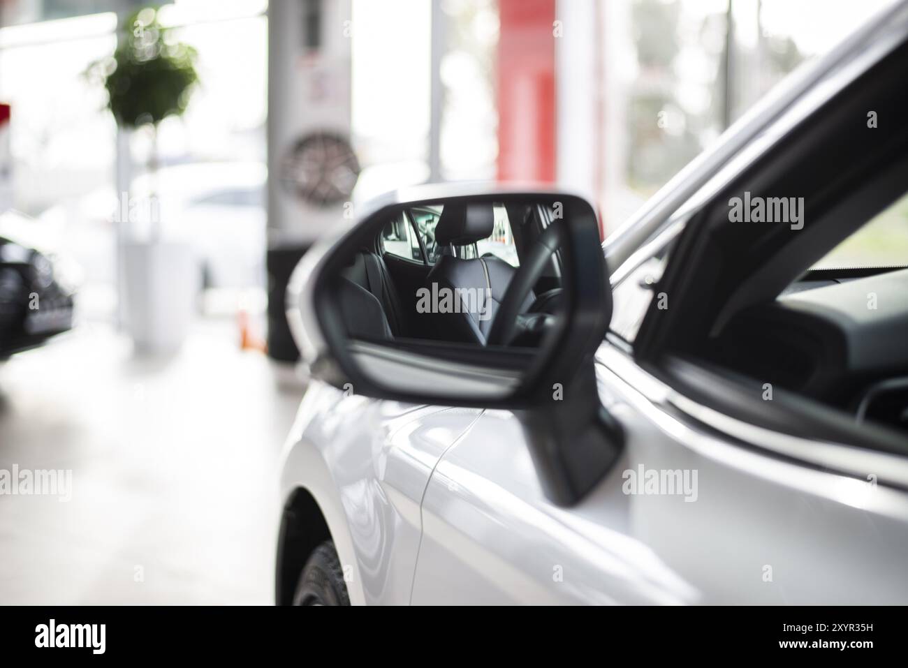 Side view new car front side with mirror Stock Photo - Alamy