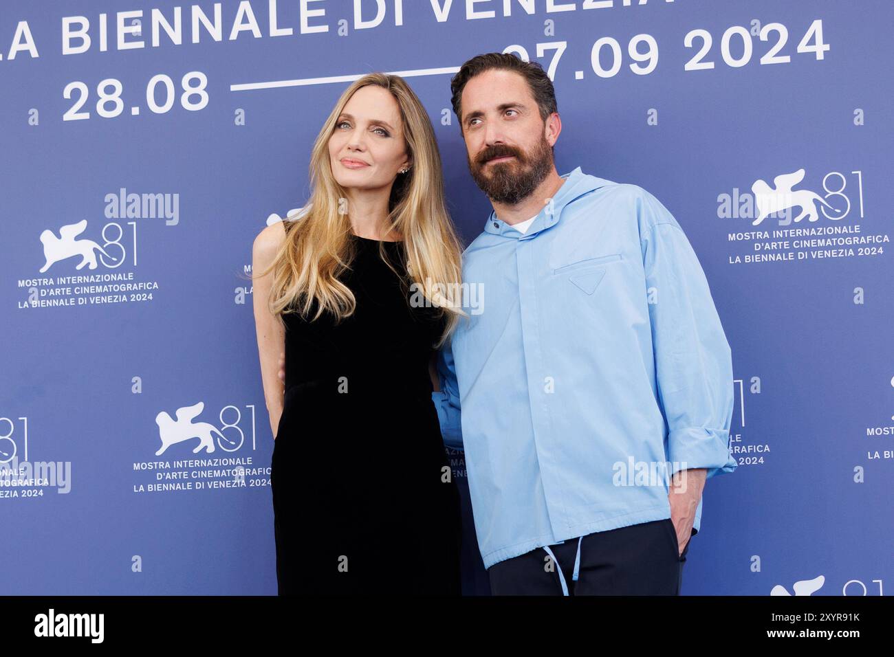 Angelina Jolie and Pablo Larrain pose for photographers at the photo ...