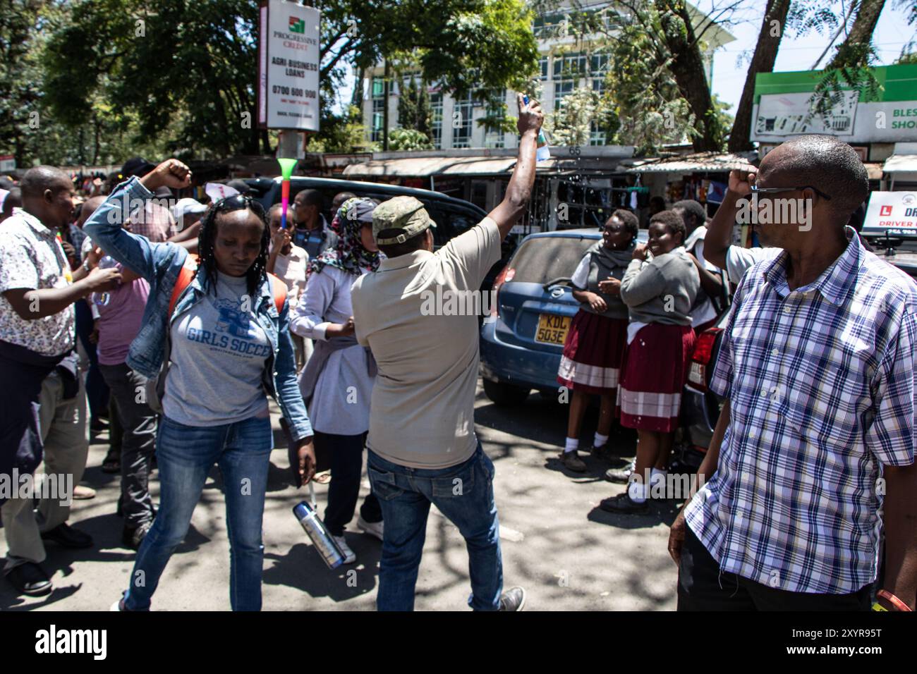 Nakuru, Kenya. 30th Aug, 2024. A teachers holds a placard during a ...