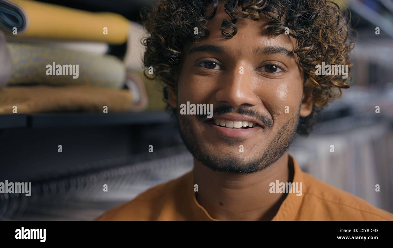 Arabian Indian latino man buyer customer shopping buy clothes textile ...