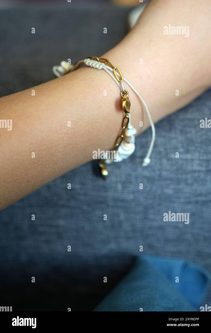 Women wearing bracelets hi-res stock photography and images - Alamy