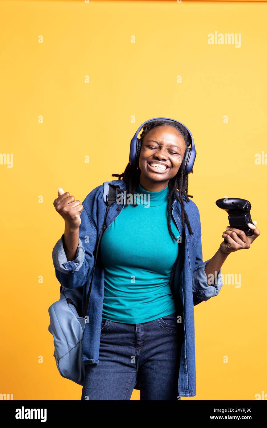 Delighted person playing intense gaming console game, celebrating win ...